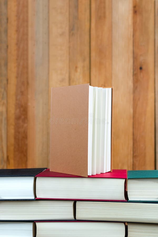 Book Standing on a Pile of Books Stock Photo - Image of advertising ...