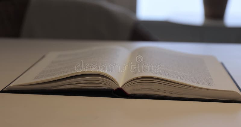 Book in a table in a room stock video. Video of coziness - 259181197
