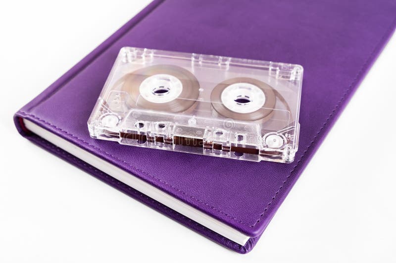 Book with a Tape Cassette stock image. Image of storage - 351375235