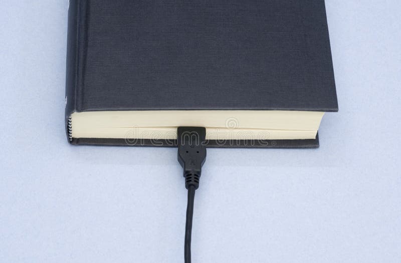 Book and usb cable stock photo. Image of plug, education - 56840994