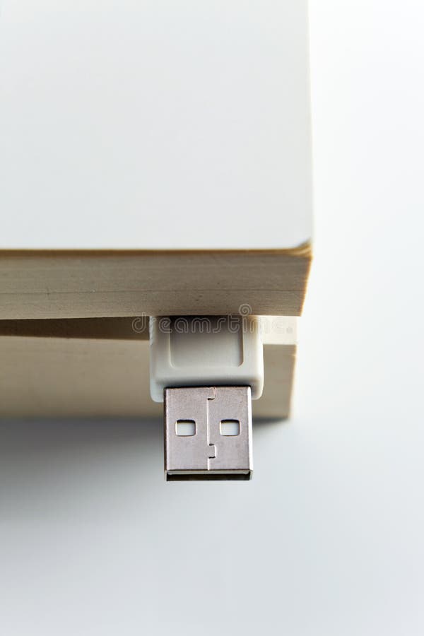 Book with USB plug stock image. Image of communication - 24876677