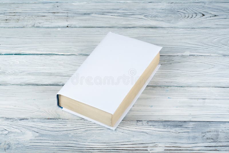 Book on a White Wooden Table. Education Business Concept. Stock Photo ...