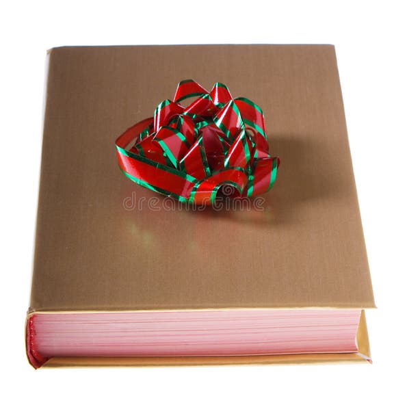 Book Wrapped in Gold with Red Green Bow Stock Photo - Image of ...