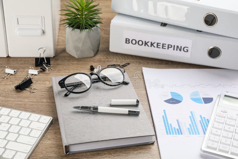 Bookkeeper`s Workplace with Folders and Documents on Table Stock Photo ...