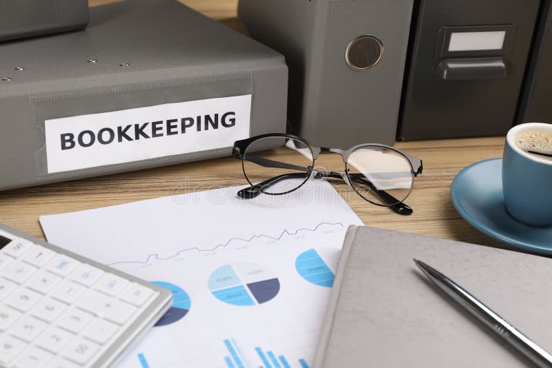 Bookkeeper`s Workplace with Folders and Documents on Table Stock Photo ...
