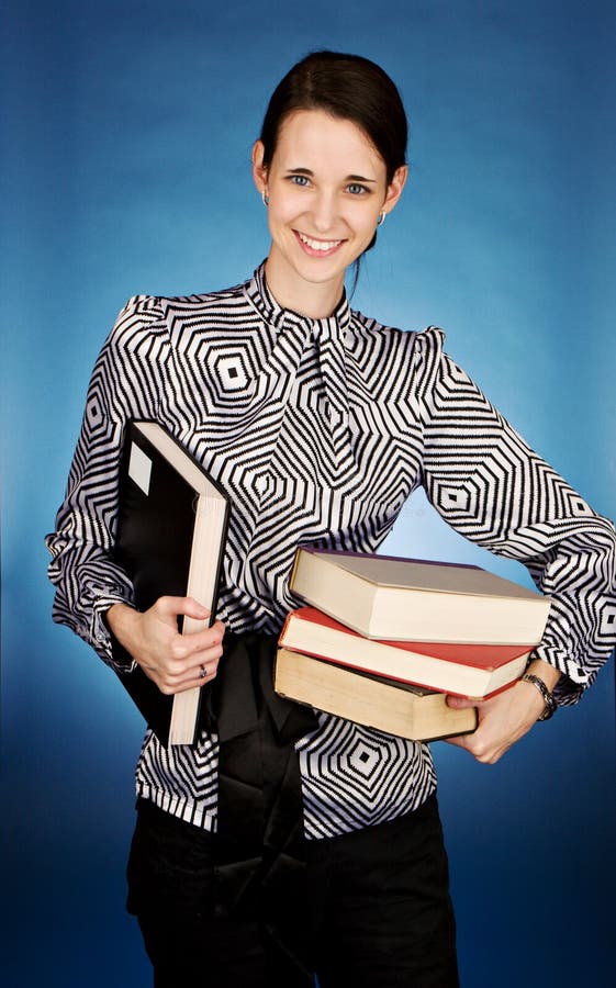 Woman Carrying Books stock image. Image of background - 5489367