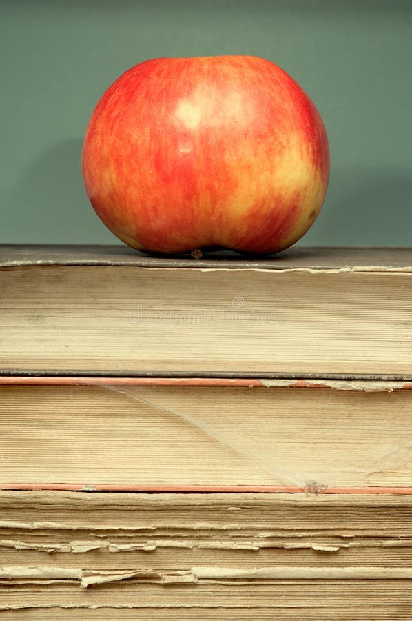 Books and apple stock image. Image of study, antique - 18505365
