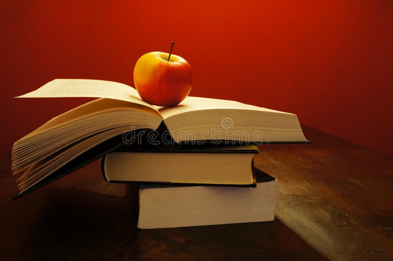 Books and a apple stock image. Image of books, open, elstar - 24522209