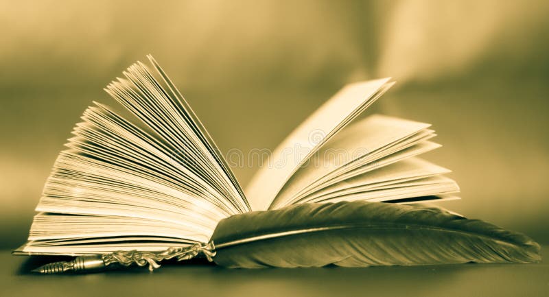 An open book and a pen stock image. Image of feather - 153302273