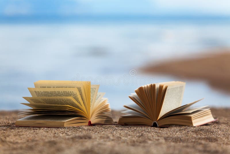 Books on a beach stock image. Image of shore, water, bokeh - 51463699