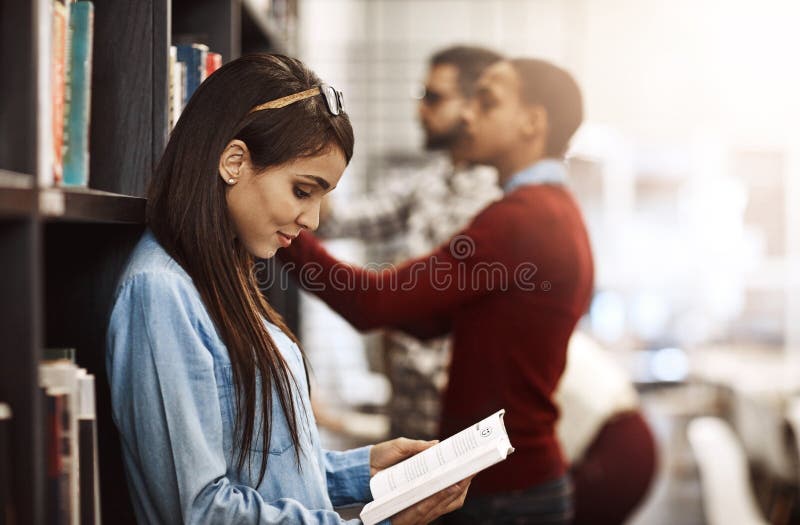 Books are the Best Sources of Knowledge. a University Student Reading a ...