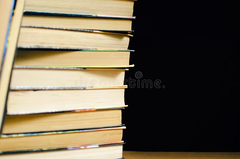 Books on a Black Background. Knowledge, Learning Concept Stock Photo ...