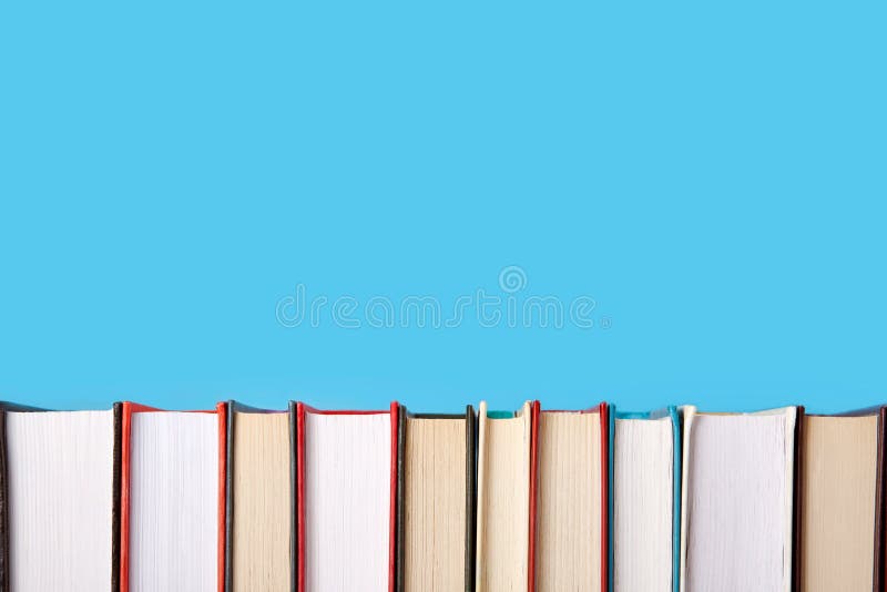 A Stack of Books on Blue Background. Stock Photo - Image of education ...