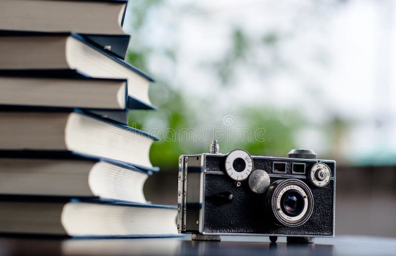 Books and Cameras Put on the Floor. White Leather Book and Study Stock ...