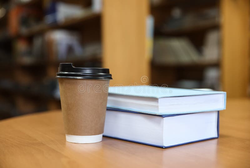 Books and Cup of Coffee on Table Stock Photo - Image of knowledge, book ...