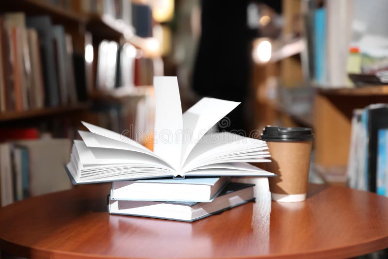 Books and Cup of Coffee on Table Stock Image - Image of library, hobby ...