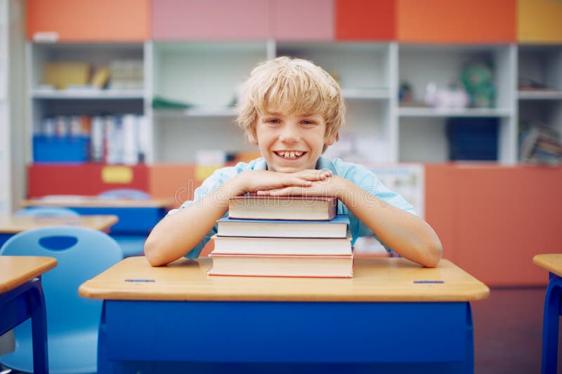 Books, Desk and Education with Portrait of Boy Student in Classroom for ...