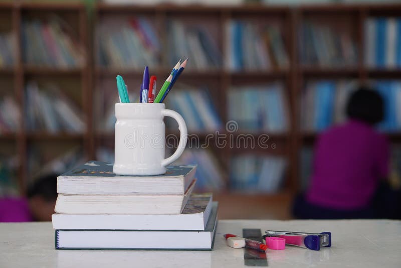Books on the Desk in the School Library. Stock Photo - Image of ...