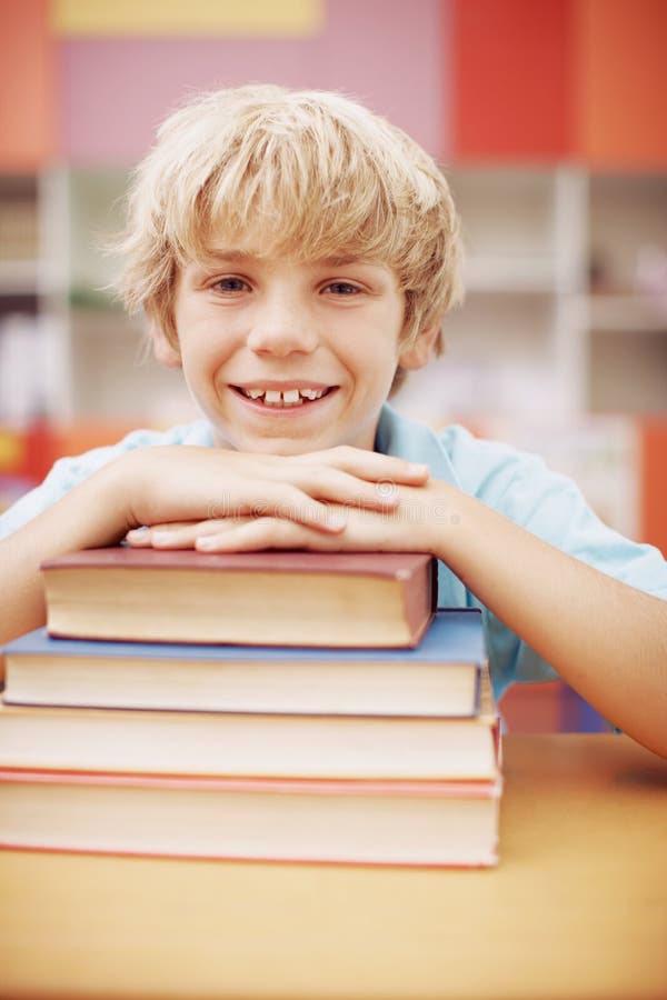 Books, Education and Portrait of Boy Student in Classroom of School for ...