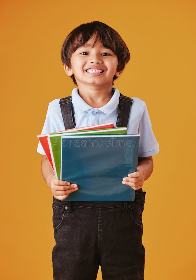 Books, Education and Portrait of Child in Studio with Studying for Test ...