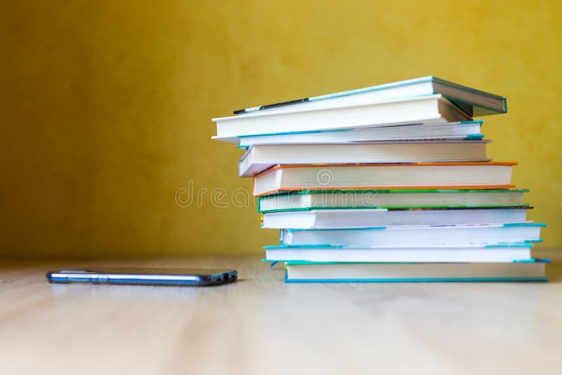 Books and Electronic Book on the Table. DIstance Learning Stock Image ...