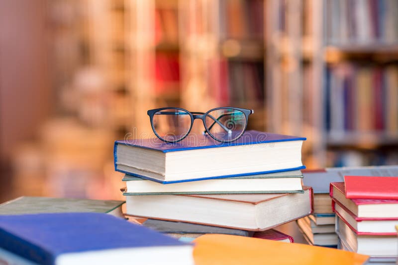 Books with Eyeglasses at the Library Stock Photo - Image of concept ...