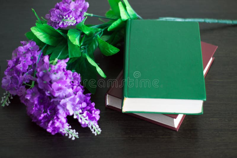 Books with Flowers on a Wood Table. Stock Photo - Image of book, spring ...
