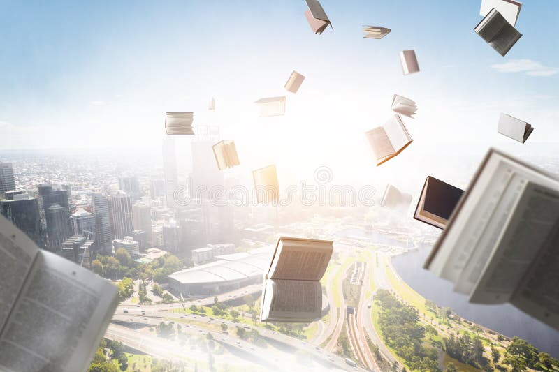 Books flying in the sky stock photo. Image of clever - 146253756