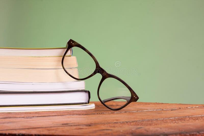 Books And Glasses On A Wooden Table Stock Photo - Image of reading ...