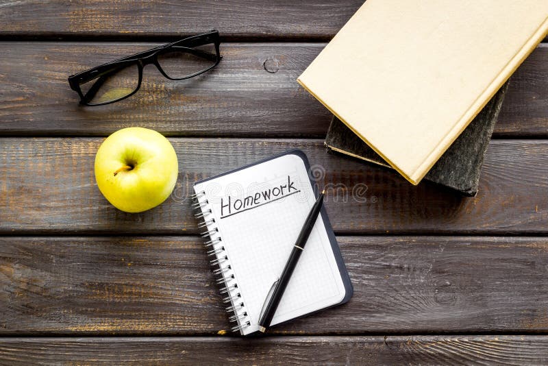 Books for Homework on Dark Wooden Student Desk Top-down Stock Photo ...