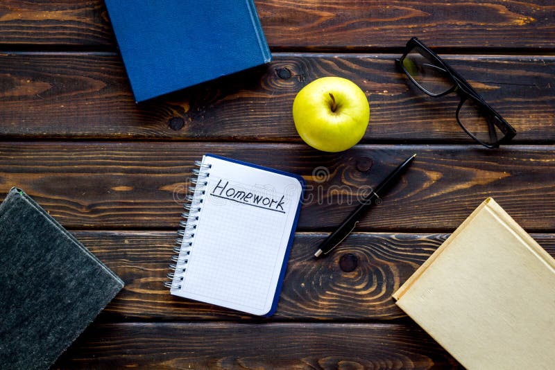 Books for Homework on Dark Wooden Student Desk Top-down Stock Image ...