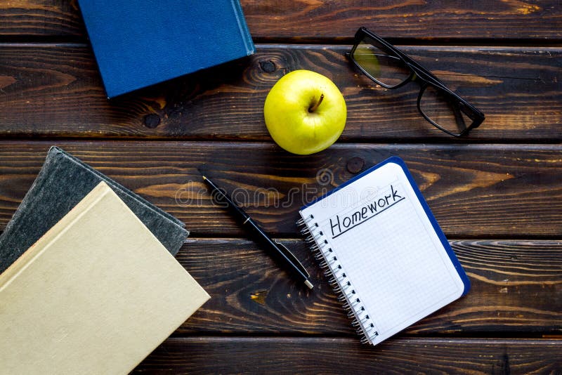 Books for Homework on Dark Wooden Student Desk Top-down Stock Image ...