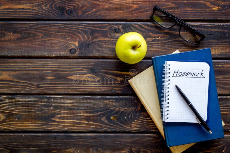 Books for Homework on Dark Wooden Student Desk Top-down Copy Space ...