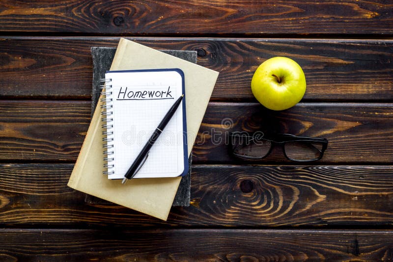 Books for Homework on Dark Wooden Student Desk Top-down Copy Space ...
