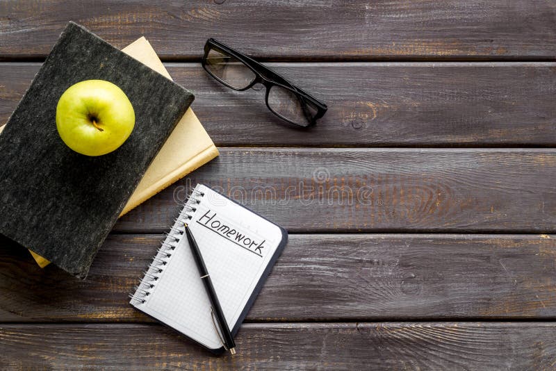 Books for Homework on Dark Wooden Student Desk Top-down Copy Space ...