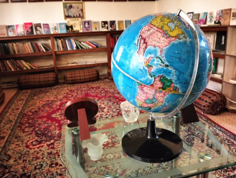 Books at the Library. a Collection of Books and a Desk at a Library or ...