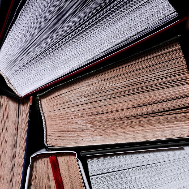 Books. Lots of Colourful Thick Open Books Stand on a Dark Background ...
