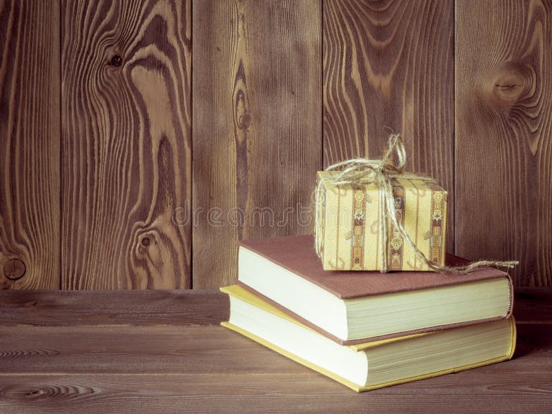Books lying on the table stock photo. Image of table - 69703456