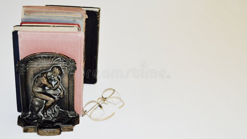 Books. Old Books with Book End of the Thinker Stock Photo - Image of ...