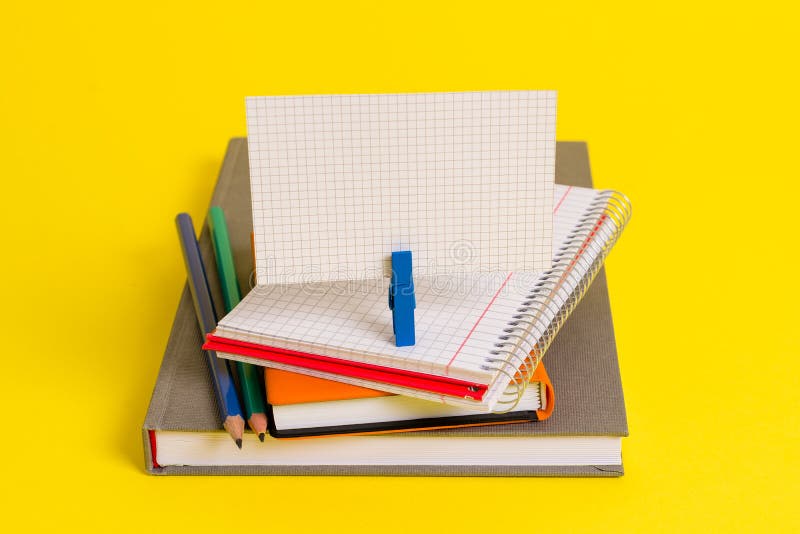 Books, Pencils and an Empty Rectangle Square Shaped Reminder Above a ...