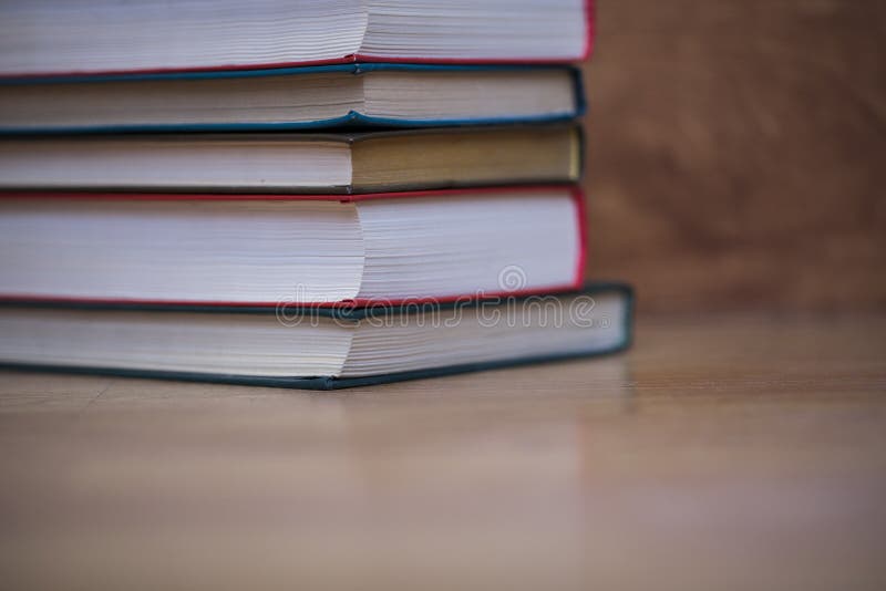 Books Piled Up on the Library Table. Stock Photo - Image of cover ...