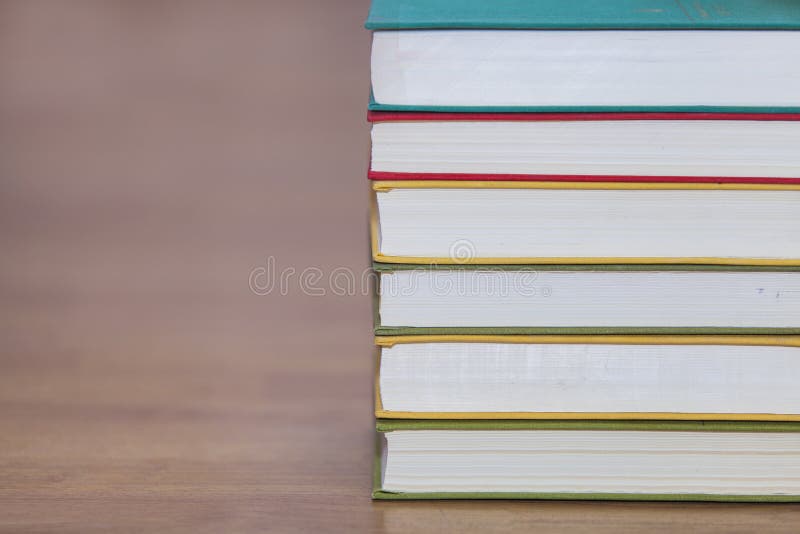 Books Piled Up on the Library Table. Stock Image - Image of library ...