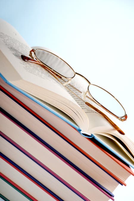 Books with reading glasses stock image. Image of publishing - 4570157