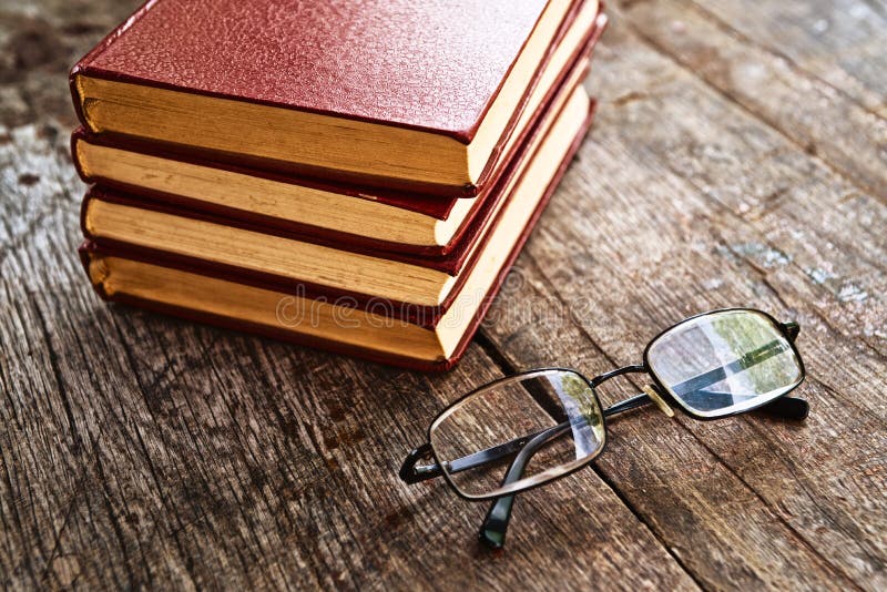 Books and Reading Glasses on Table Stock Photo - Image of education ...