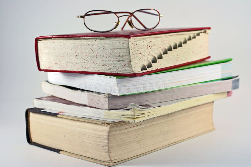 Row Of Reference Books With Paper And Pencil Stock Photo - Image of ...