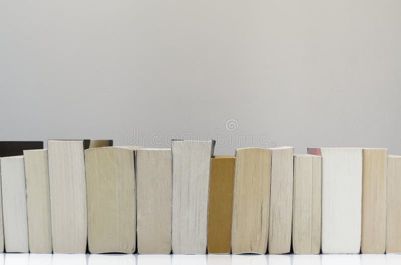 Books in a Row on Light Grey Background Stock Photo - Image of design ...