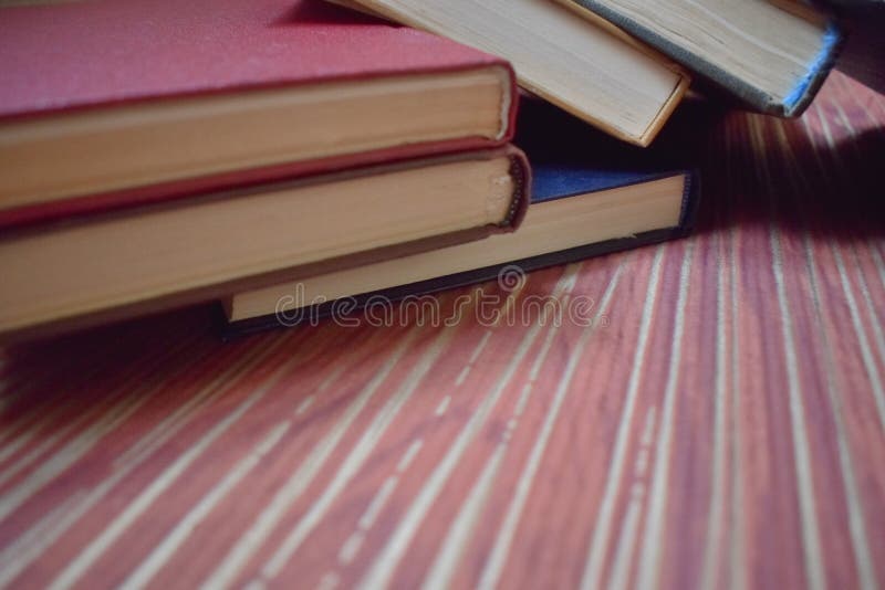 The Books are Scattered on the Bed Stock Photo - Image of paper, board ...