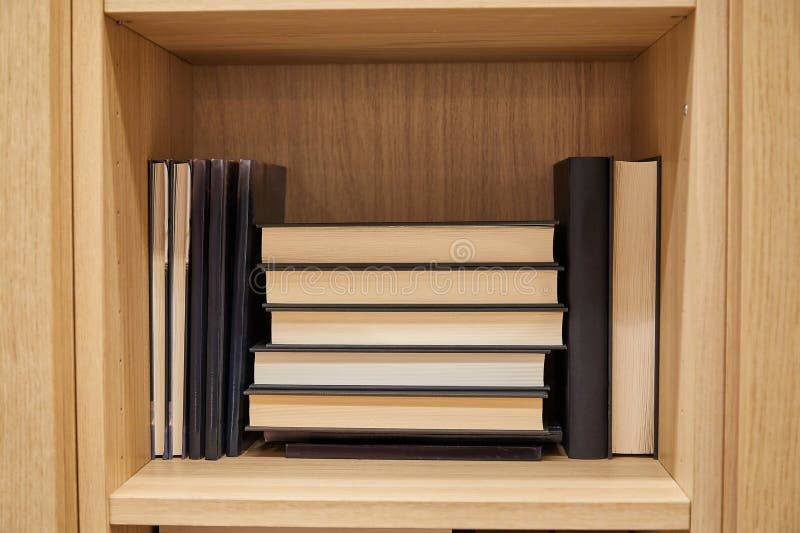 Books on a shelf stock photo. Image of library, bookshelf - 350503108