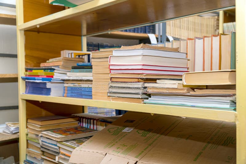 Books on a Shelf in the Library Editorial Stock Photo - Image of ...