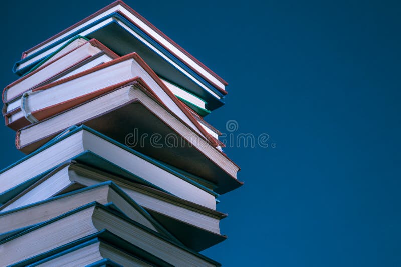 Books Stack on a Dark Background. Twilight Lighting Stock Photo - Image ...